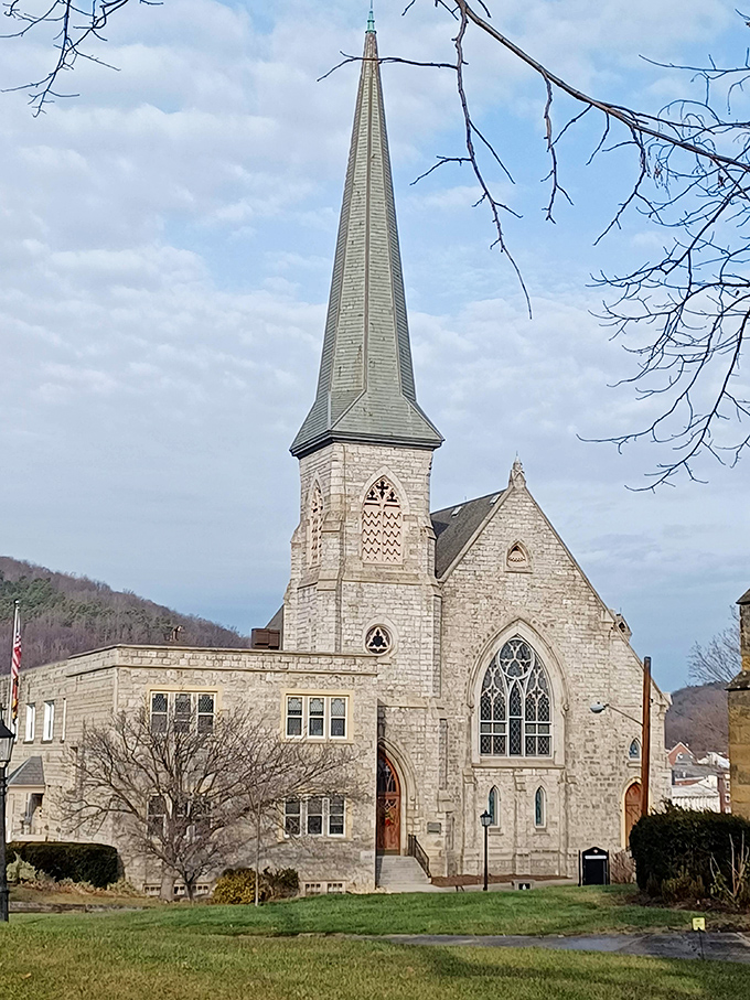 This stone church's soaring spire has been Cumberland's spiritual skyscraper for generations, pointing heavenward with architectural eloquence.
