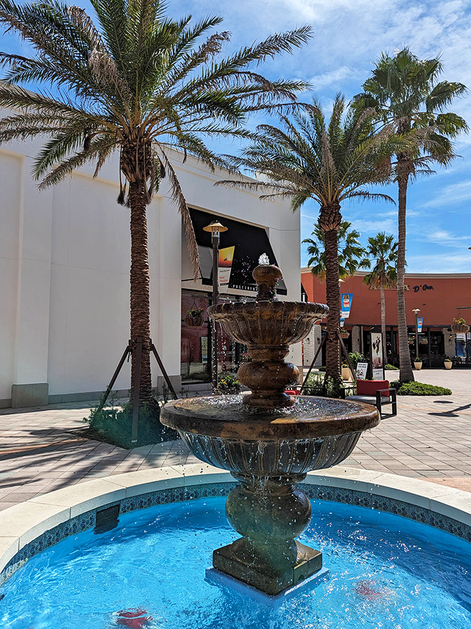 Mediterranean-inspired fountains offer peaceful respite between shopping conquests, their gentle splashing drowning out the sound of your credit card weeping.