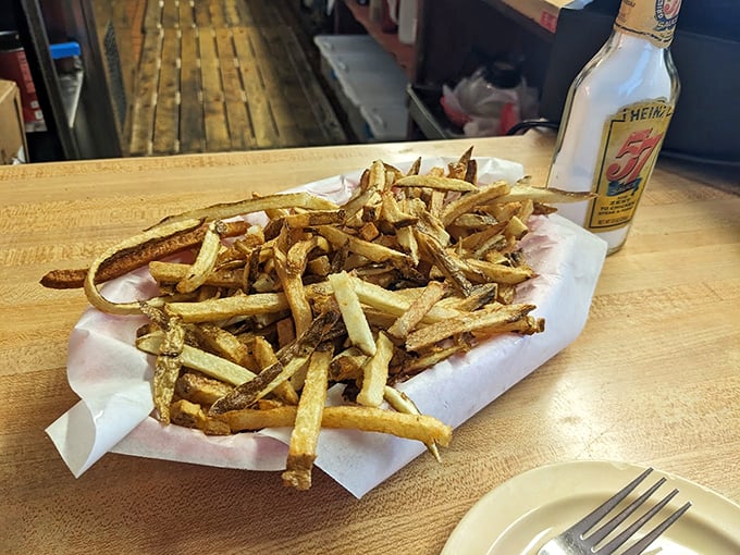 These hand-cut fries aren't just a side dish&mdash;they're supporting actors deserving of their own Oscar, perfectly golden and ready for their close-up.