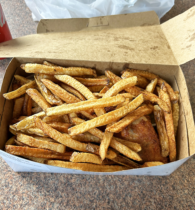 These fries aren't sidekicks &ndash; they're co-stars, golden and crisp, demanding equal billing with their feathered counterpart.