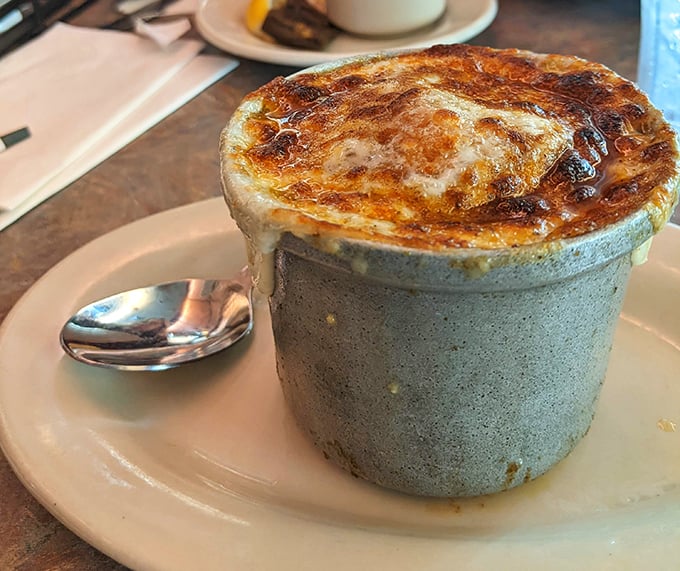 French onion soup with a cheese cap so perfect it deserves its own Instagram account. Spoon-breaking satisfaction guaranteed.
