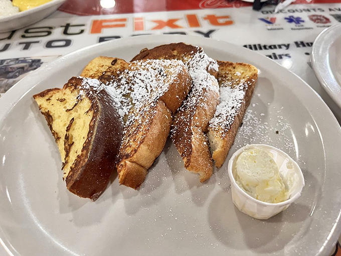 French toast that's achieved the golden-brown perfection most of us only dream about. Powdered sugar snowfall included.