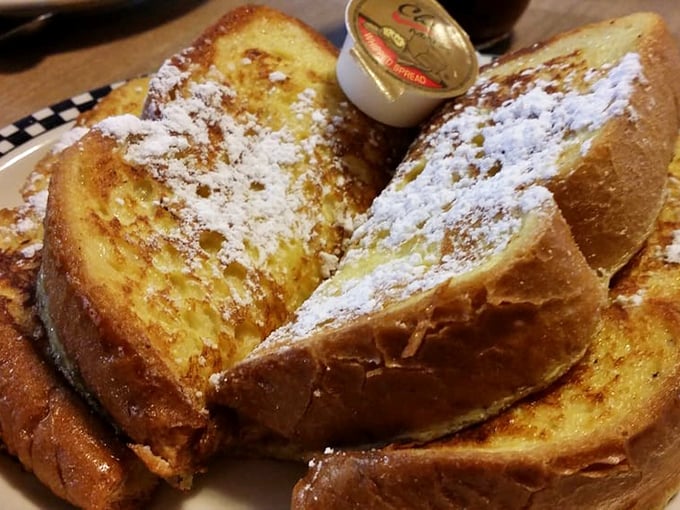 French toast that's achieved celebrity status in Lincoln. Dusted with powdered sugar and thick enough to make ordinary bread weep with inadequacy.