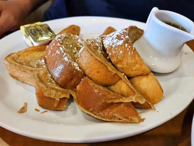 French toast that makes you question every other breakfast decision you've ever made. That golden-brown color should be framed in a museum.