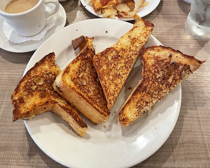 French toast so perfectly golden, it makes you wonder if they hired Midas as a breakfast consultant.