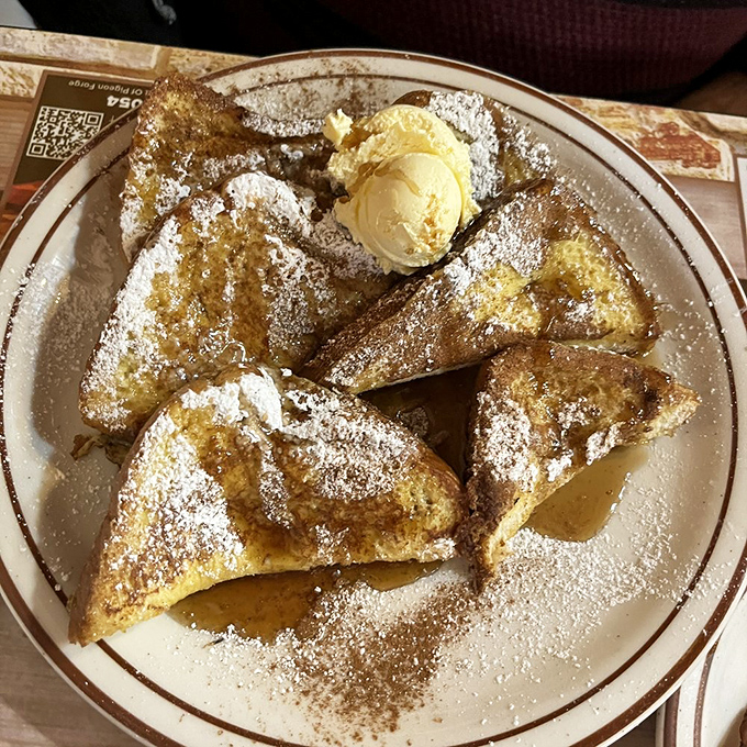 French toast that's dressed for success with powdered sugar and a scoop of ice cream. Breakfast or dessert? The line deliciously blurs.