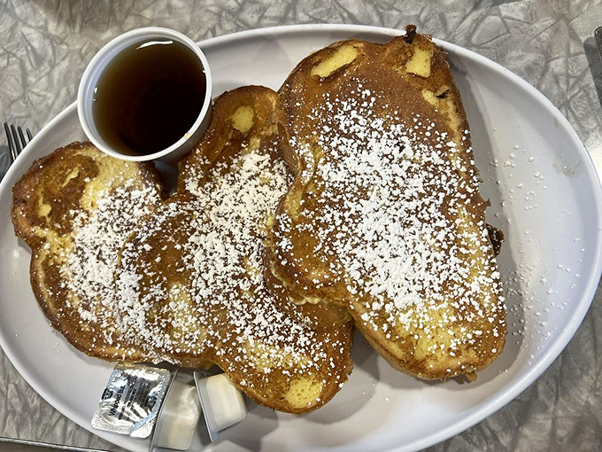 French toast that doesn't need a passport to impress&mdash;just a dusting of powdered sugar and that perfect golden crust that makes morning worth facing.