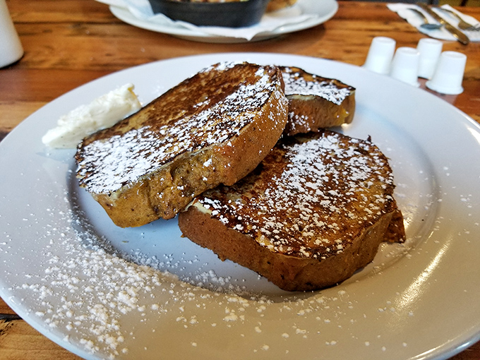 French toast that's dressed for success&mdash;powdered sugar snow on thick-cut challah that's been bathing in cinnamon-kissed batter. Breakfast royalty, indeed.