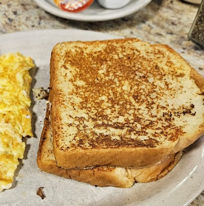 This isn't just toast; it's bread that's been transformed into a buttery canvas of breakfast perfection. Proust would approve.