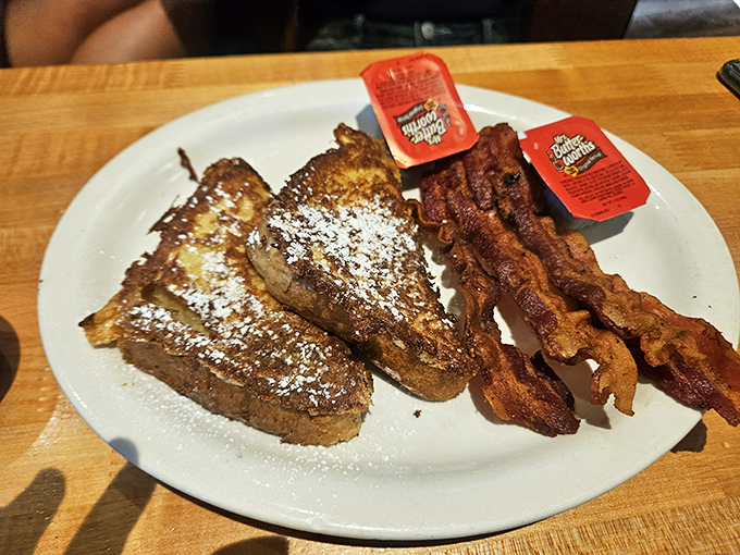 French toast that makes pancakes jealous, served with bacon that's achieved the perfect crisp-to-chew ratio. Breakfast nirvana, powdered sugar included.