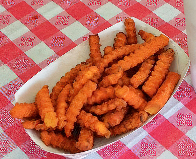 Crinkle-cut fries that look like they're auditioning for a Norman Rockwell painting—crispy, golden, and unapologetically straightforward.