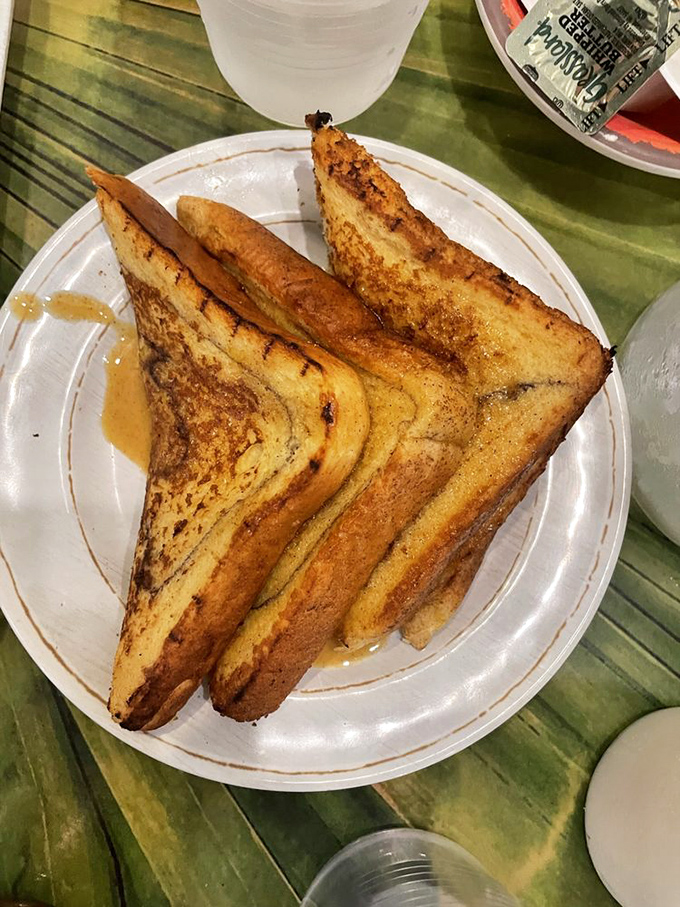 Golden-brown French toast triangles that make you wonder why circles and squares ever thought they could compete in the breakfast geometry wars.