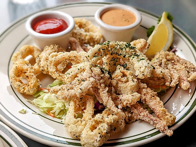 Fried calamari that achieves the impossible &ndash; crispy exterior, tender interior, and not a hint of rubber tire texture that plagues lesser versions.