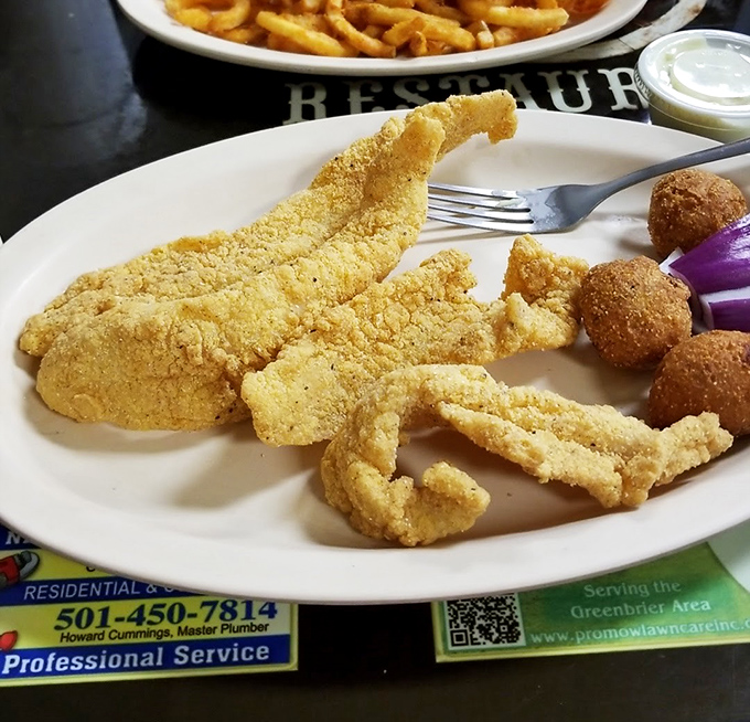 Golden catfish so perfectly fried it makes you wonder why anyone bothers with fancy seafood when this exists right here.