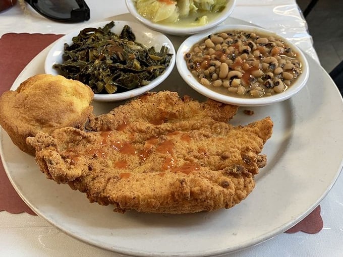 Crispy catfish that makes you question every other fried fish you've ever eaten. Paired with collards and black-eyed peas &ndash; the holy trinity.