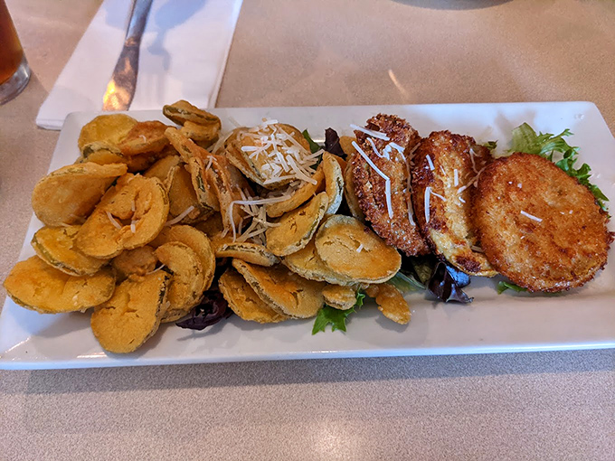 Fried green tomatoes that would make Fannie Flagg proud. Crispy exterior, tangy interior, and a sprinkle of parmesan that ties it all together.