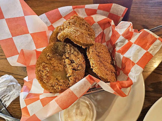 Fried green tomatoes &ndash; tangy slices of unripe tomato transformed into crispy, cornmeal-coated discs of delight that would make Fannie Flagg proud.