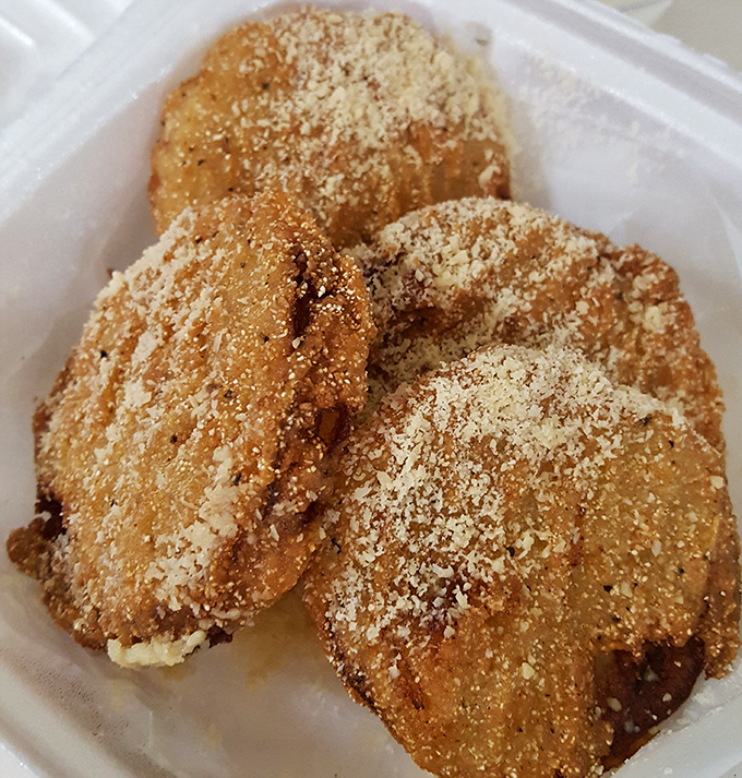 Fried green tomatoes that would make Fannie Flagg herself nod in approval—crispy, golden discs of Southern comfort dusted with the perfect amount of cornmeal.