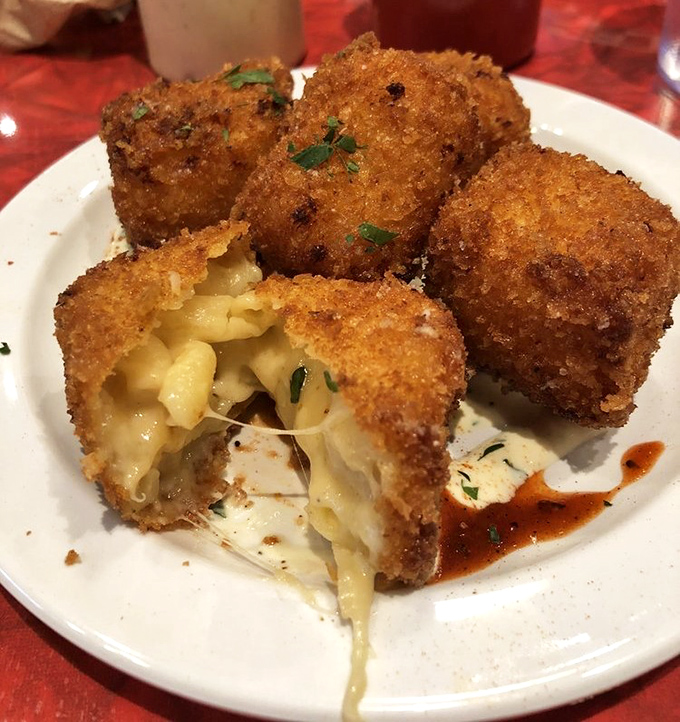Fried mac and cheese that makes you question all other comfort foods. The crispy exterior gives way to molten cheesy goodness.