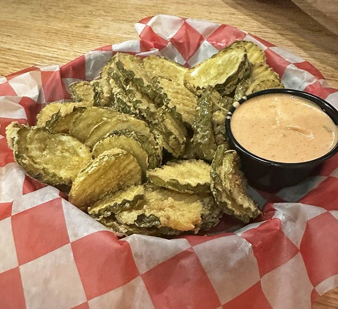 These aren't your average pickle chips. Crispy, tangy, and utterly addictive when dunked in that house-made Cajun remoulade &ndash; resistance is futile.