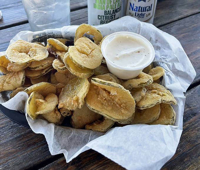Crispy, golden fried pickles that snap with tangy brine beneath their crunchy coating&mdash;the perfect sidekick to smoky barbecue and cold beer.