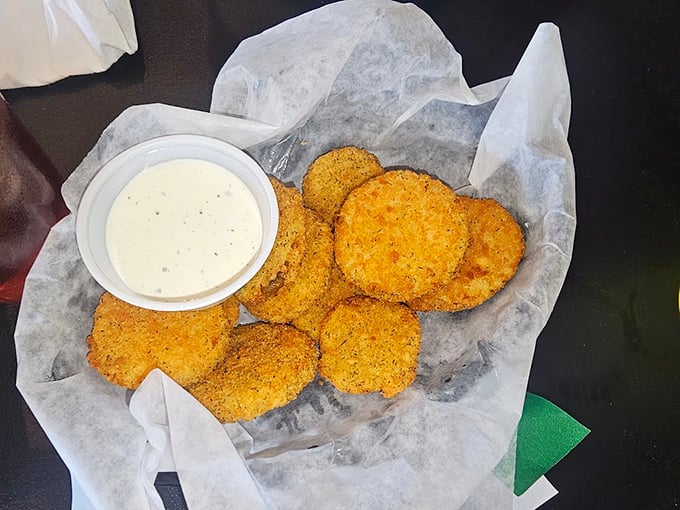 Fried pickles: Because sometimes vegetables need to live a little dangerously too. Crispy, tangy perfection with creamy dip.
