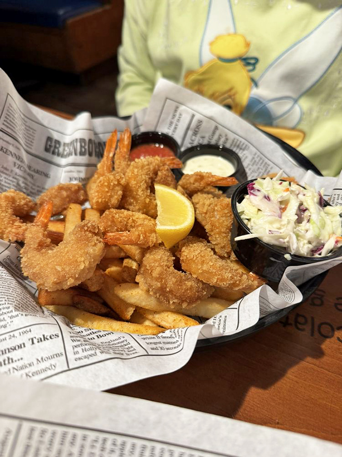 Newspaper-lined baskets of golden-fried shrimp&mdash;crispy on the outside, tender within&mdash;served with the kind of fries that disappear one "just one more" at a time.