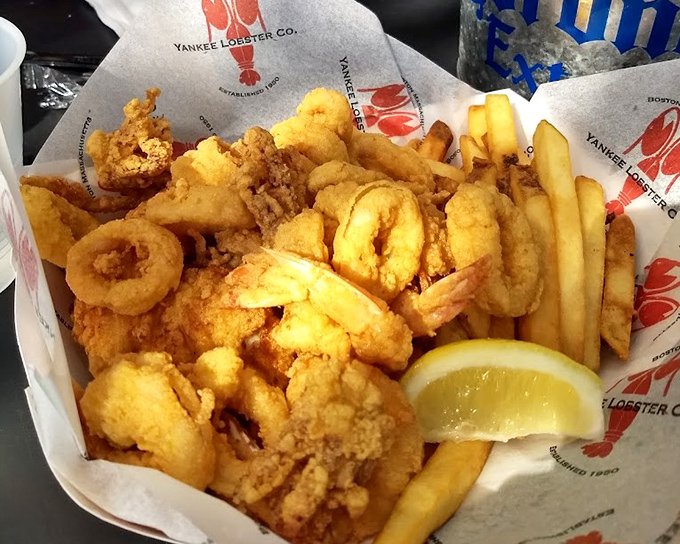 Fried shrimp so perfectly golden they could make a food photographer weep, served with fries that are clearly not an afterthought.