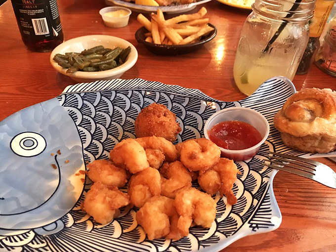 Fried shrimp so perfectly golden they practically high-five your taste buds, served on those whimsical fish plates that somehow make everything taste better.