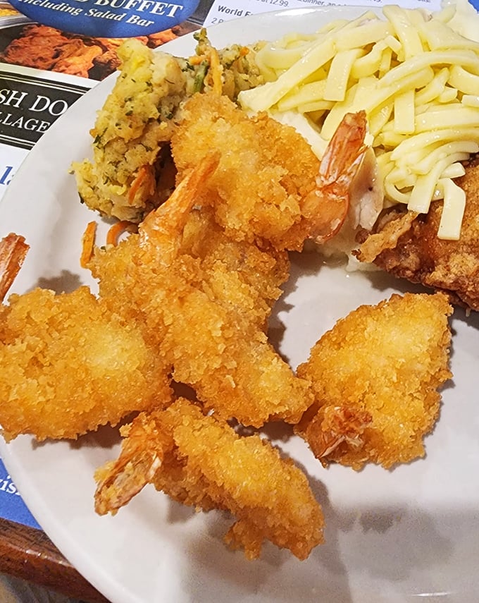 Golden-fried shrimp that crunch like your childhood dreams, served alongside stuffing that could start family feuds over the last spoonful.