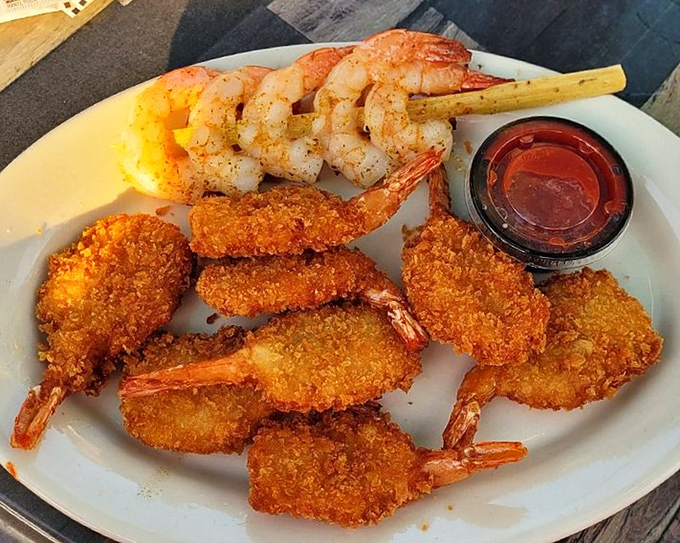 These jumbo shrimp wear their golden panko armor with pride, standing at attention alongside grilled companions that bring a lighter touch to the seafood party.