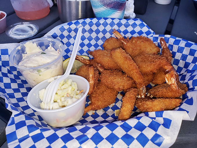 Golden-fried shrimp that crunch like autumn leaves, served with coleslaw that brings just enough tang to cut through the richness.