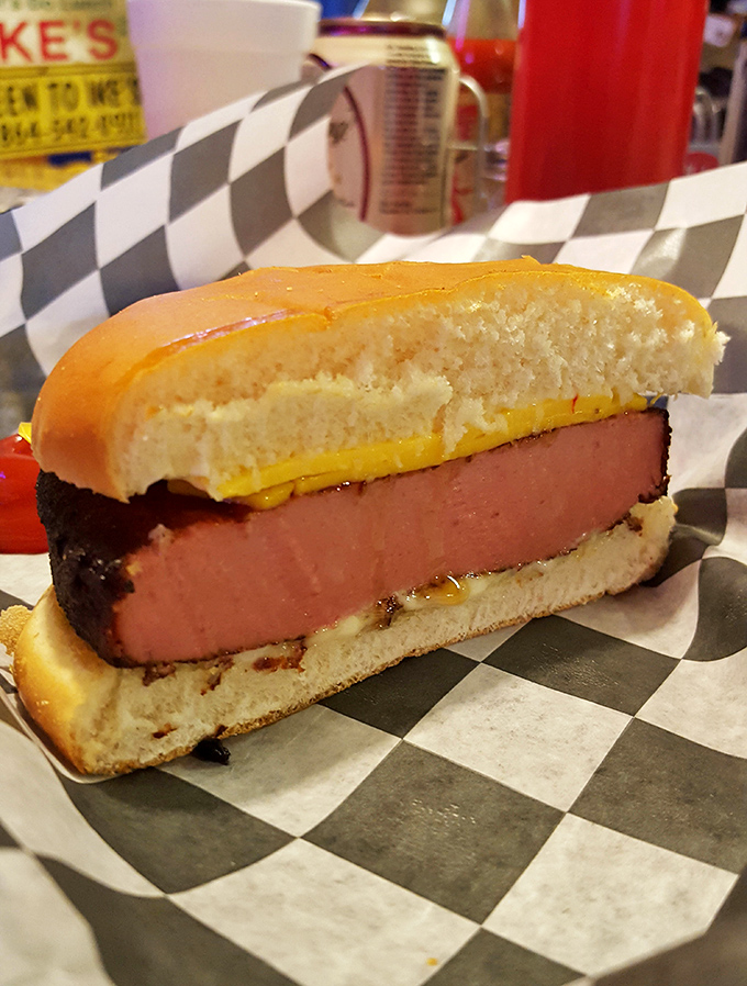 The fried bologna sandwich is proof that Southern ingenuity can transform humble ingredients into something worth writing home about, immediately.