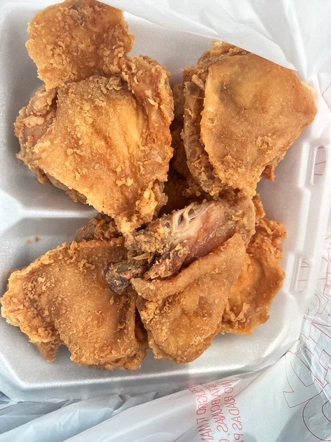 Golden-fried chicken that makes you understand why people write songs about Southern cooking&mdash;crispy, juicy, and worth every napkin you'll need.