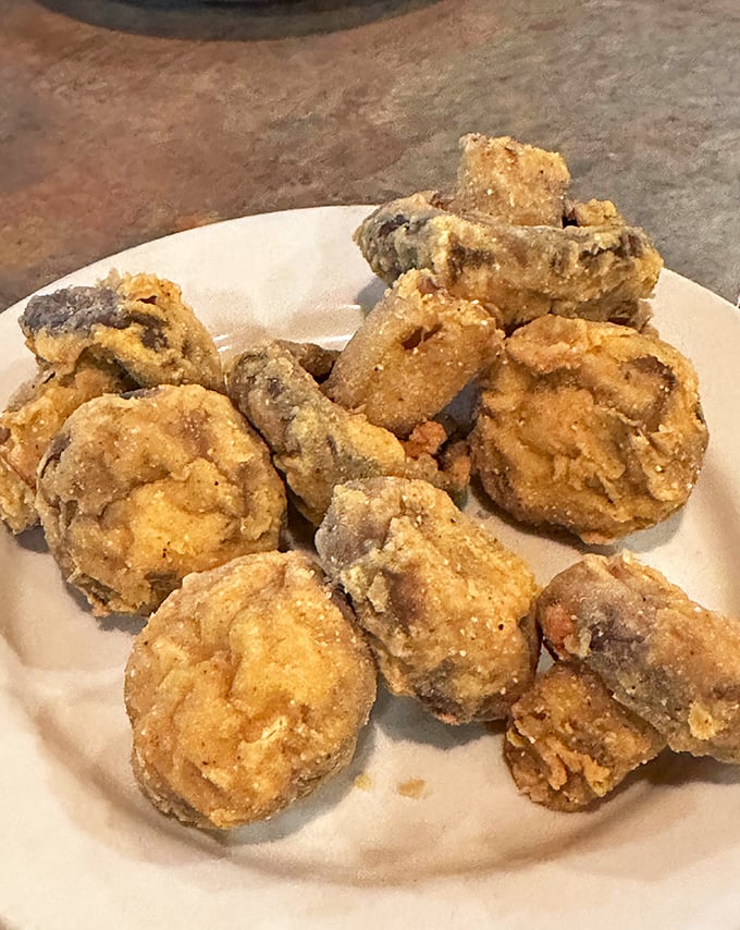 Golden-fried mushrooms that make you wonder why vegetables ever bothered trying to be healthy when they could be this delicious.