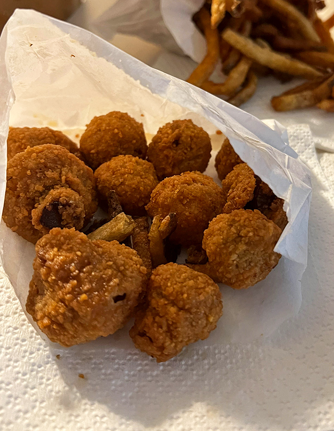 Golden-brown mushroom nuggets that crunch like autumn leaves. The perfect bite-sized treasures for when a burger needs a sidekick.