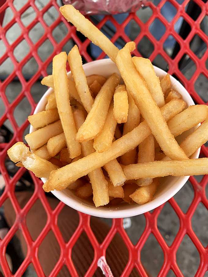 Golden fries that could make a French chef weep with joy – crispy, salty, and absolutely worth the drive.