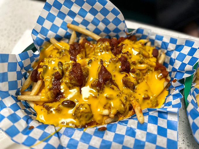 Chili cheese fries that could make a cardiologist weep&mdash;gloriously messy and worth every napkin you'll need afterward.