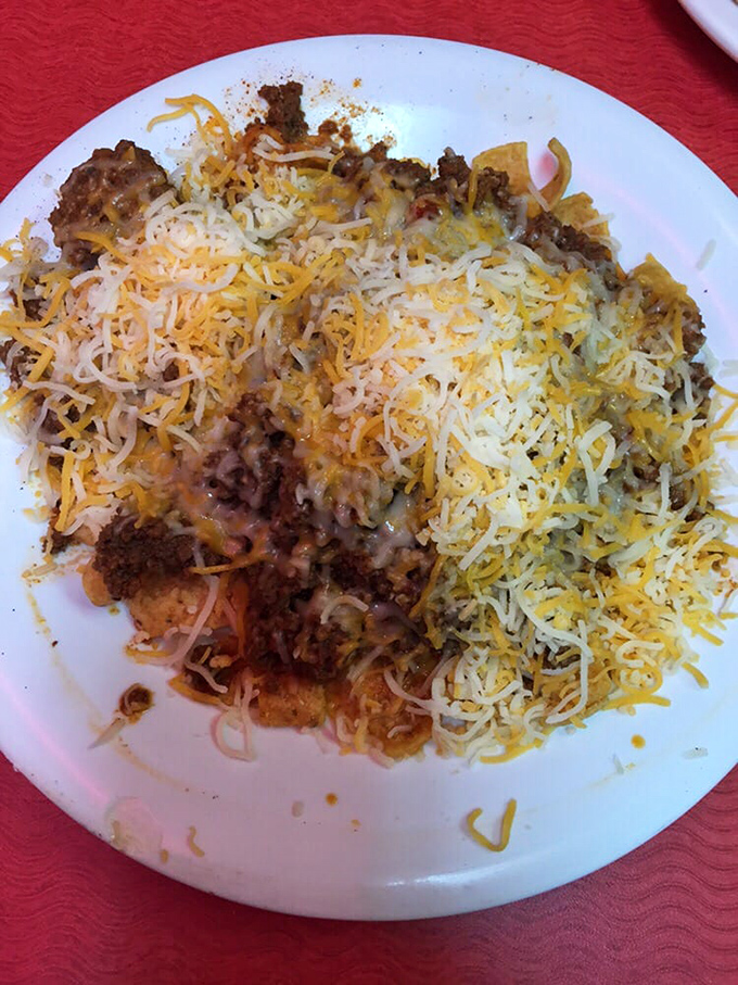 A mountain of melted cheese blankets what lies beneath&mdash;a hearty mixture that promises to cure whatever ails you.