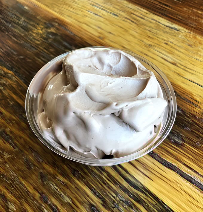 The frozen custard's velvety swirls might make you forget ice cream exists. Smoother than a jazz saxophone solo on a summer night.