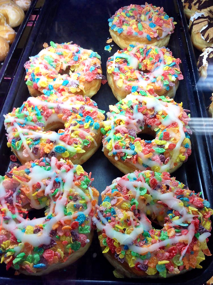 Fruity Pebbles donuts that transform your childhood cereal memories into grown-up indulgence. Your inner eight-year-old is jumping for joy.
