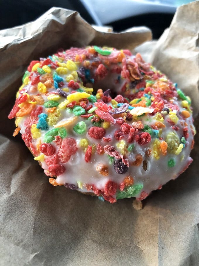 Childhood breakfast cereal meets grown-up indulgence. This Fruity Pebbles donut proves some relationships improve with age.