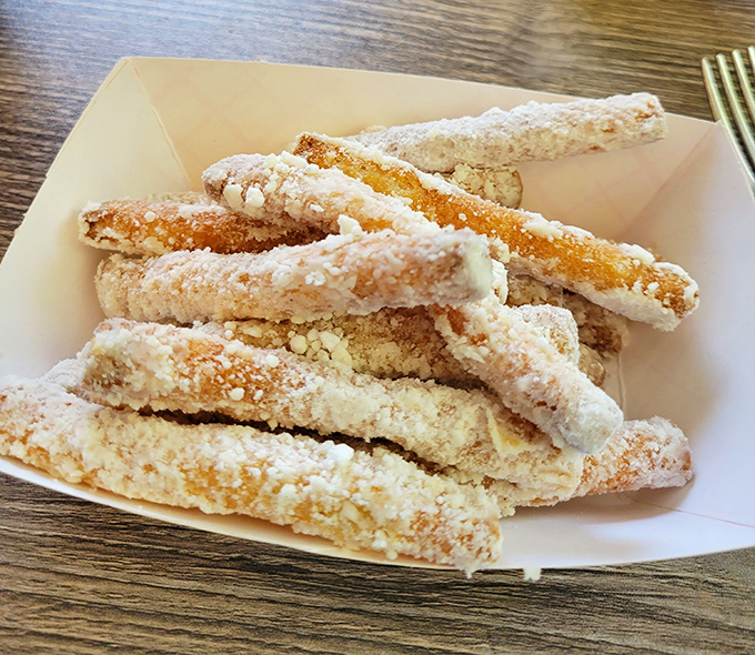 Funnel cake fries dusted with powdered sugar&mdash;the carnival came to town and decided to stay permanently.
