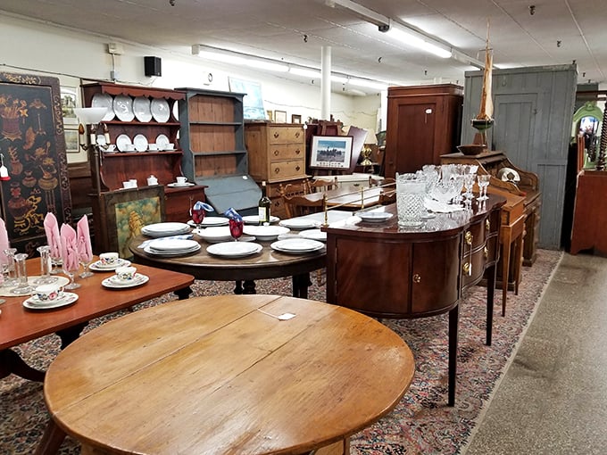 Fine furniture from bygone eras stands at attention, each piece silently boasting "they don't make 'em like this anymore."