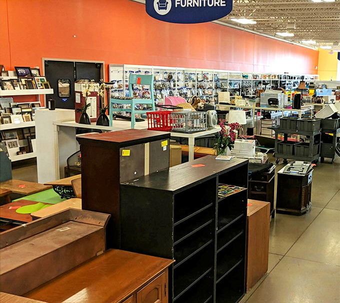 Furniture hunters navigate the well-organized showroom, where yesterday's living room sets await their second act in tomorrow's homes.