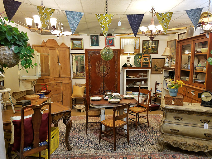 A dining set that has hosted countless family meals awaits its next chapter. The wooden buffet stands patient and dignified, like a butler in furniture form.