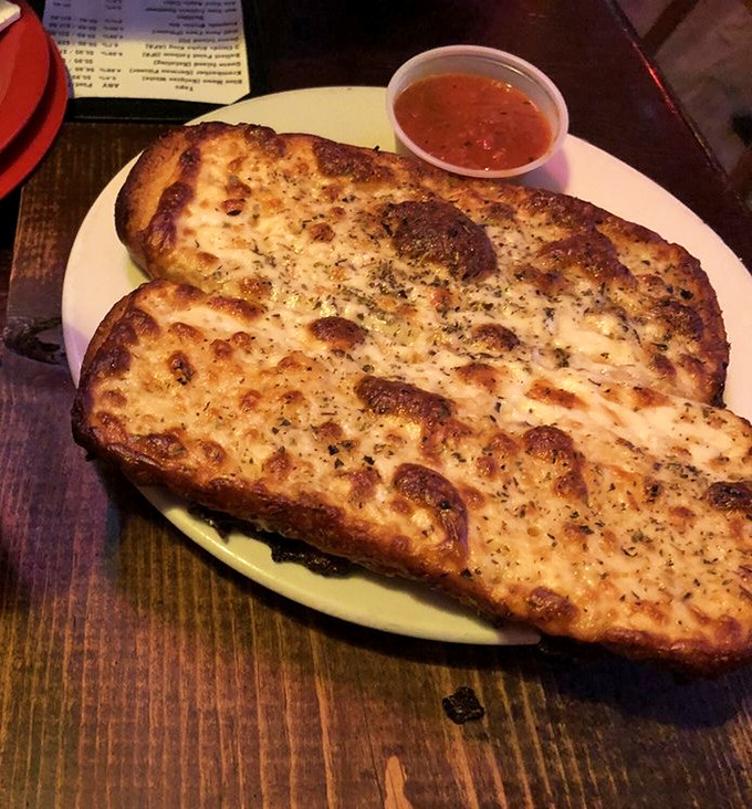 Garlic bread that doesn't mess around. This golden, cheese-laden appetizer is what garlic bread dreams of becoming when it grows up.