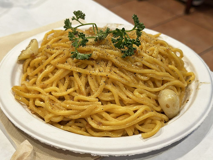 Garlic noodles that glisten with buttery goodness, topped with fresh parsley &ndash; the perfect supporting actor to your seafood star.