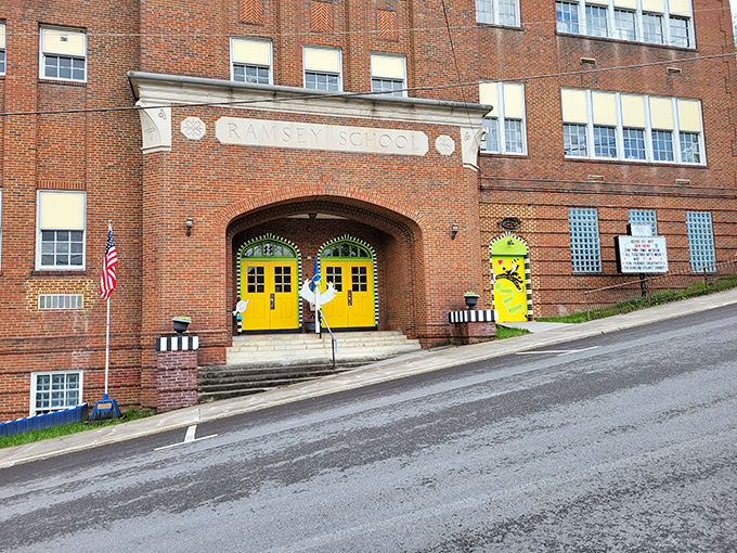 Bright yellow doors welcome visitors to Ramsey School, where education comes with a side of architectural character that money can't manufacture.