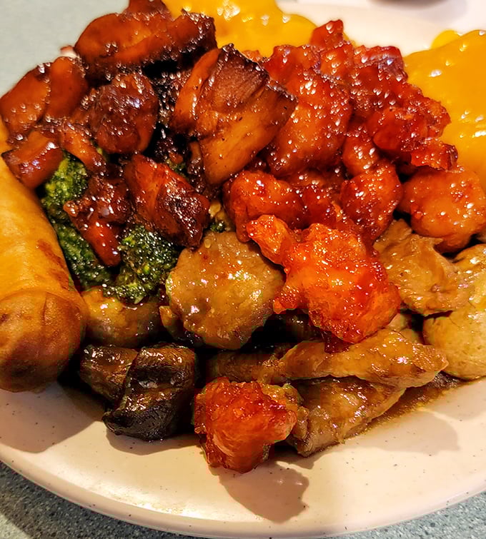 Glistening chunks of sweet and savory meat nestled among vibrant vegetables – General Tso would surely approve of his namesake.